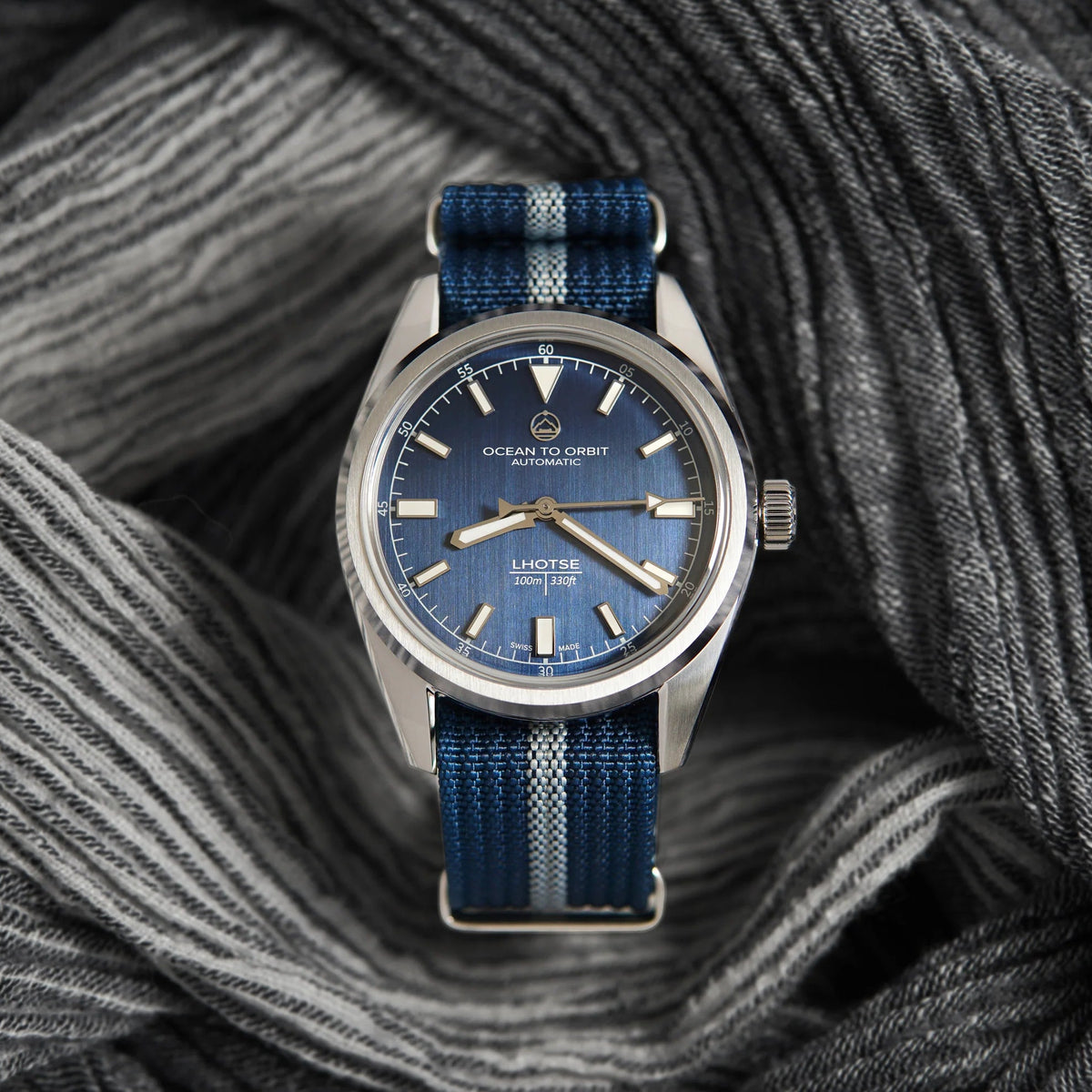 OCEAN TO ORBIT LHOTSE - BLUE STEEL ADVENTURE STRAP - The Independent ...